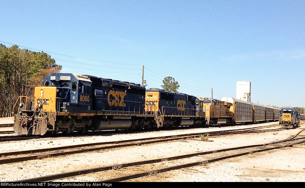 CSX SD40-2 8060, SD50-2 8666, and UP ES44AC 7413